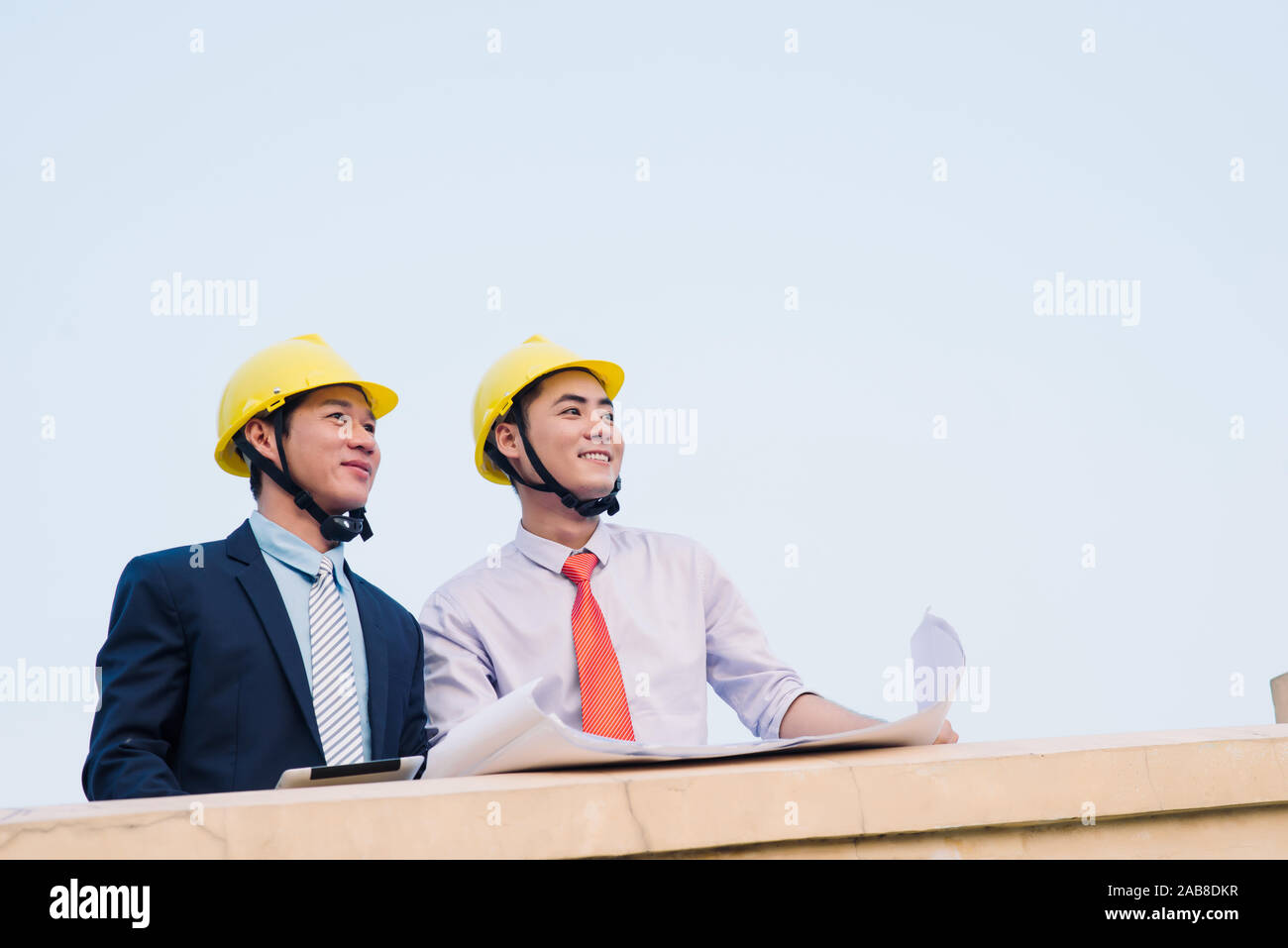 Asian engineer was acting with his secretary on the Business building ...