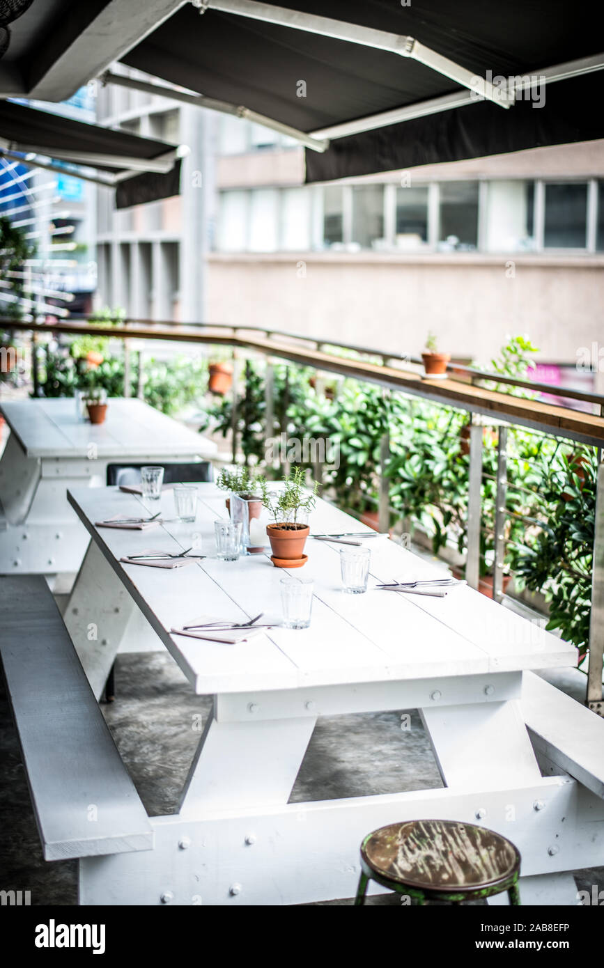 rustic country style restaurant with white walls, table seating and ...