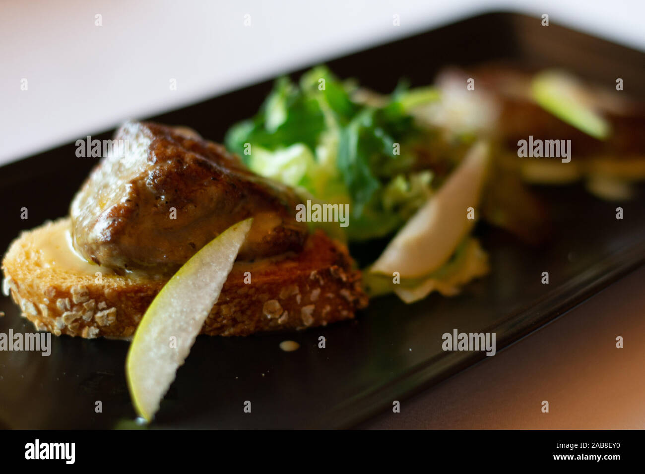 pan fried goose liver foie gras with apple slaw salad on the side Stock ...