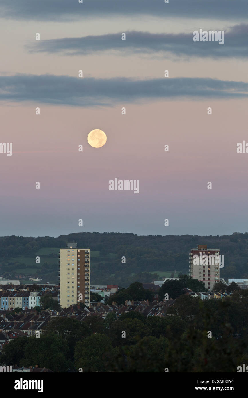 full moon over city Stock Photo - Alamy