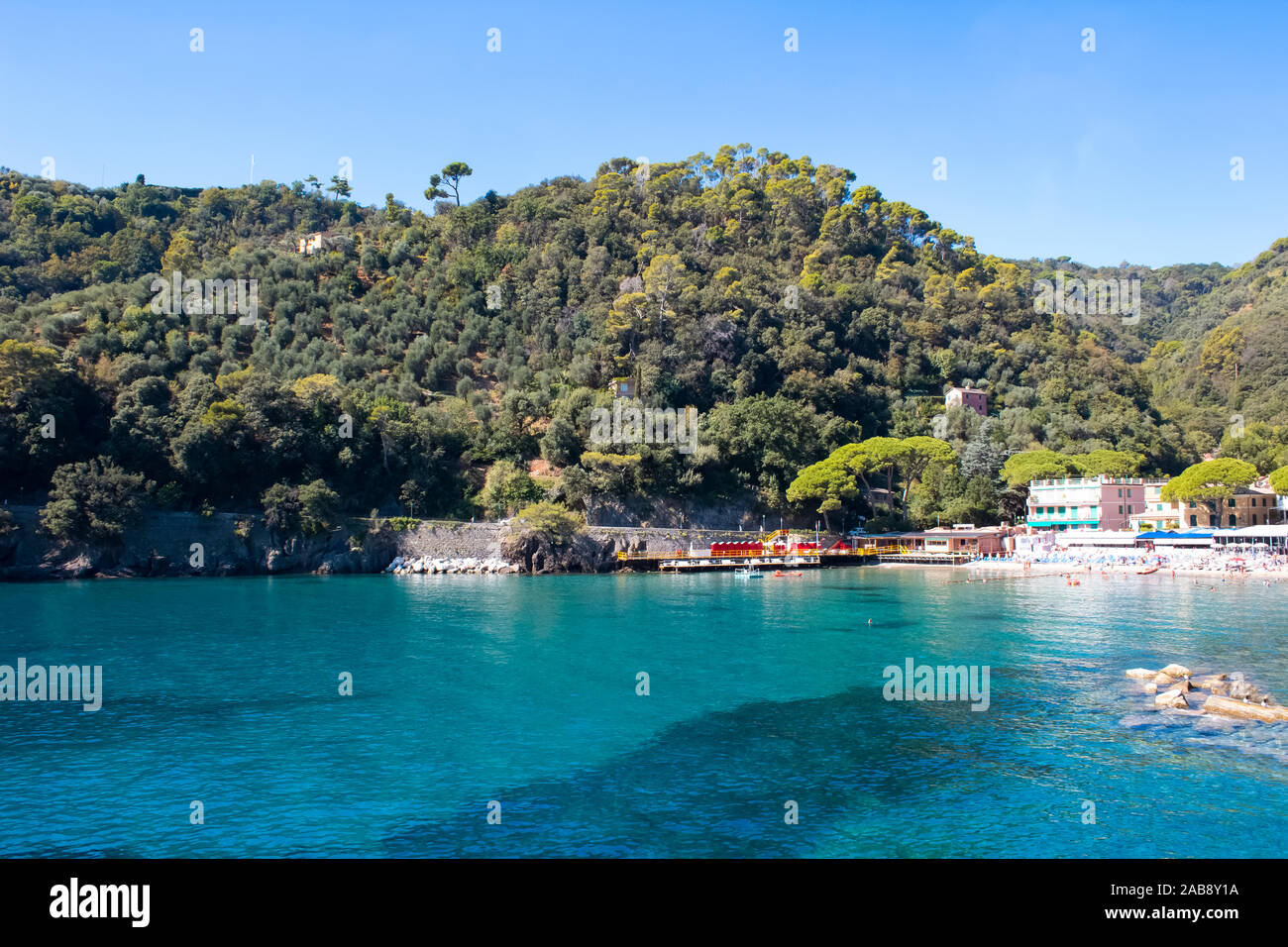 The sand beach known as paraggi near portofino in genoa on a blue sky ...
