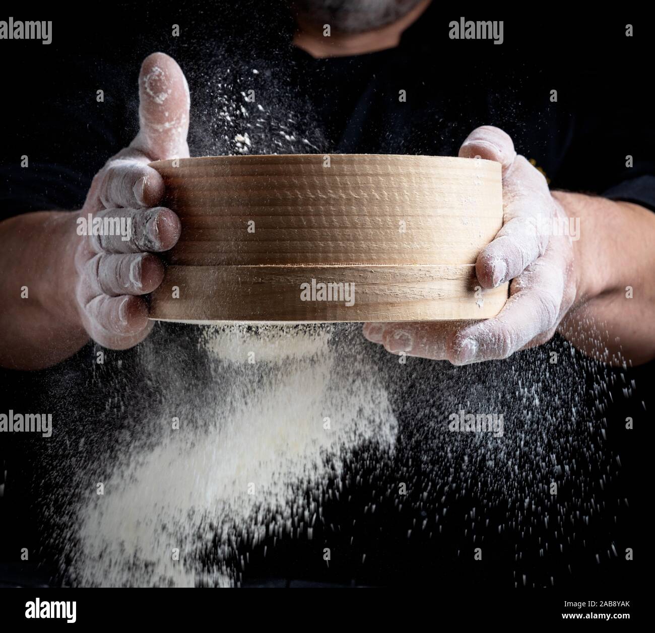 Male Baker Sifting Flour High Resolution Stock Photography and Images ...