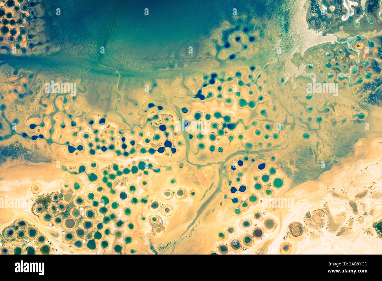Aerial view of artificial salt farm.. Senegal. West Africa. Photo made ...