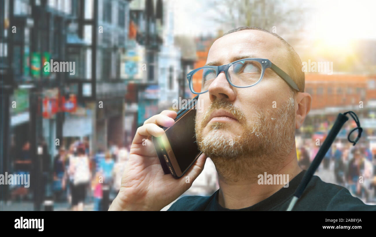 Blind man with a white stick hi-res stock photography and images - Alamy