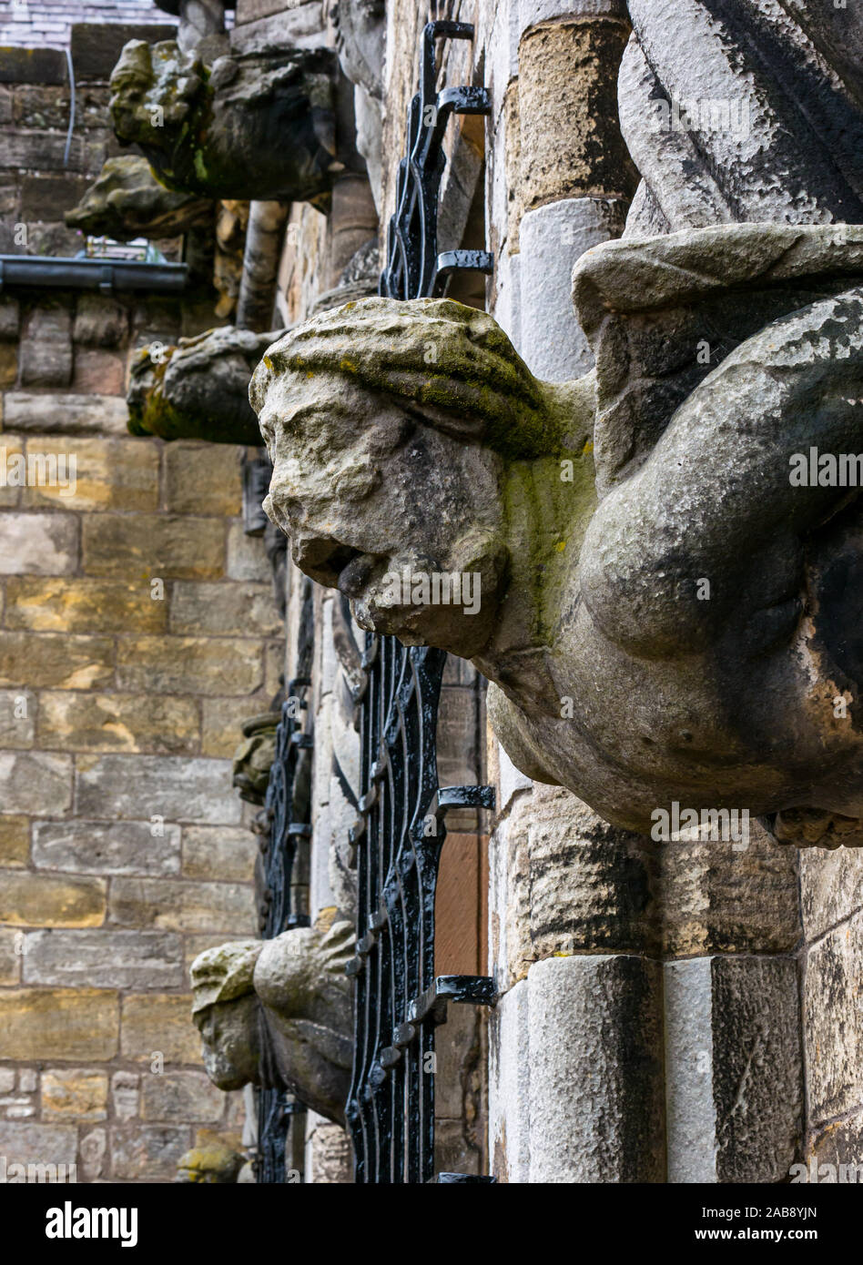 Worn old stone gargoyles on Stirling palace building, Stirling Castle ...