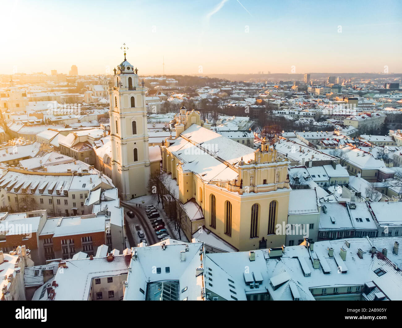Beautiful Vilnius city panorama in winter with snow covered houses ...