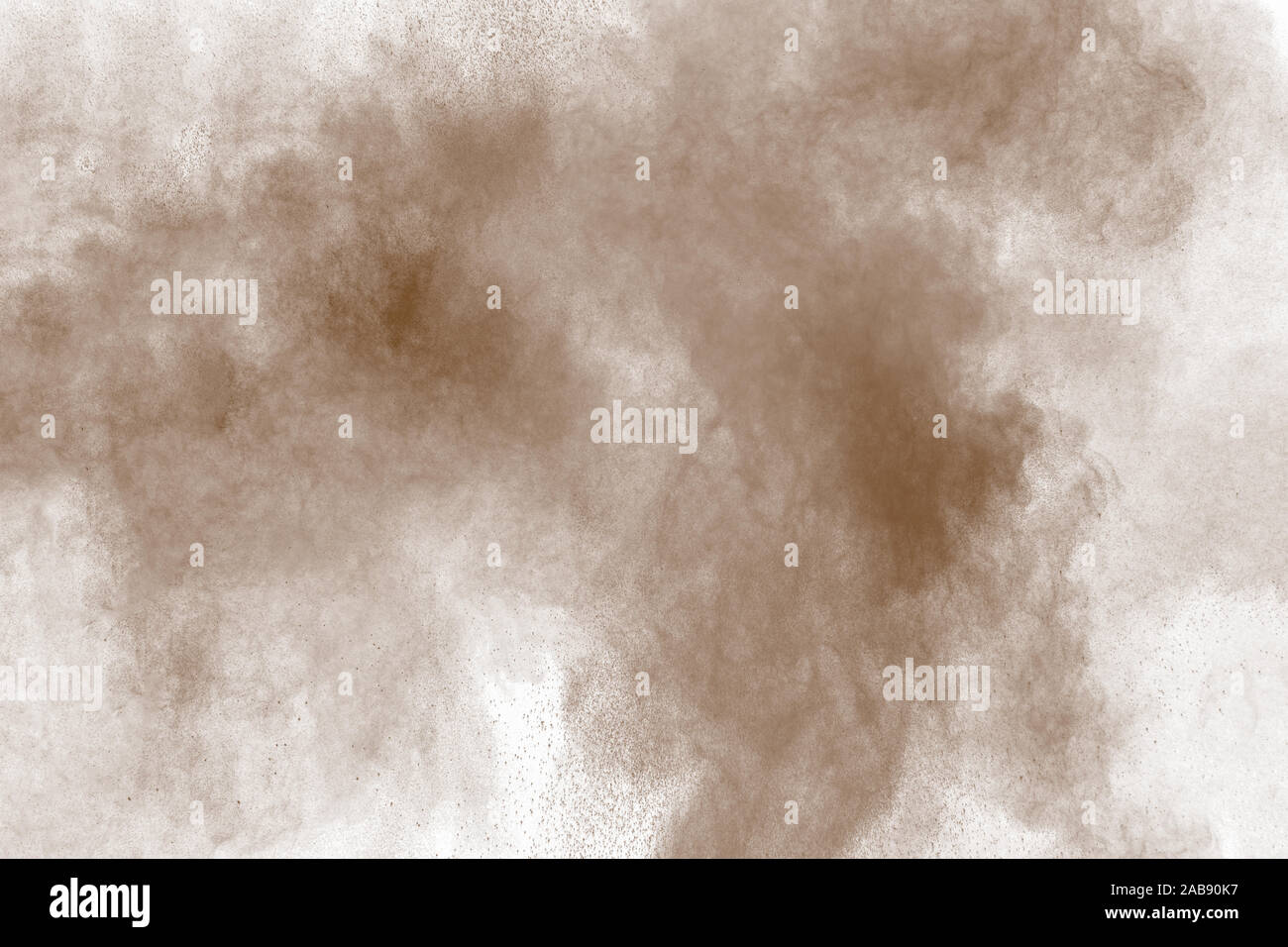 Brown dust explosion cloud.Brown particles splatter on white background ...