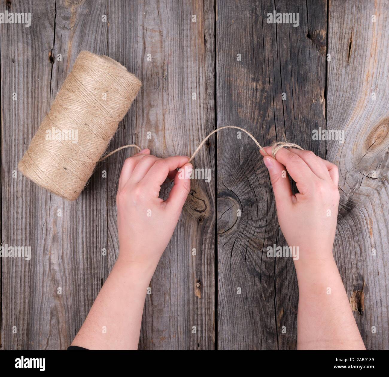 Hand Holding Rope High Resolution Stock Photography and Images - Alamy