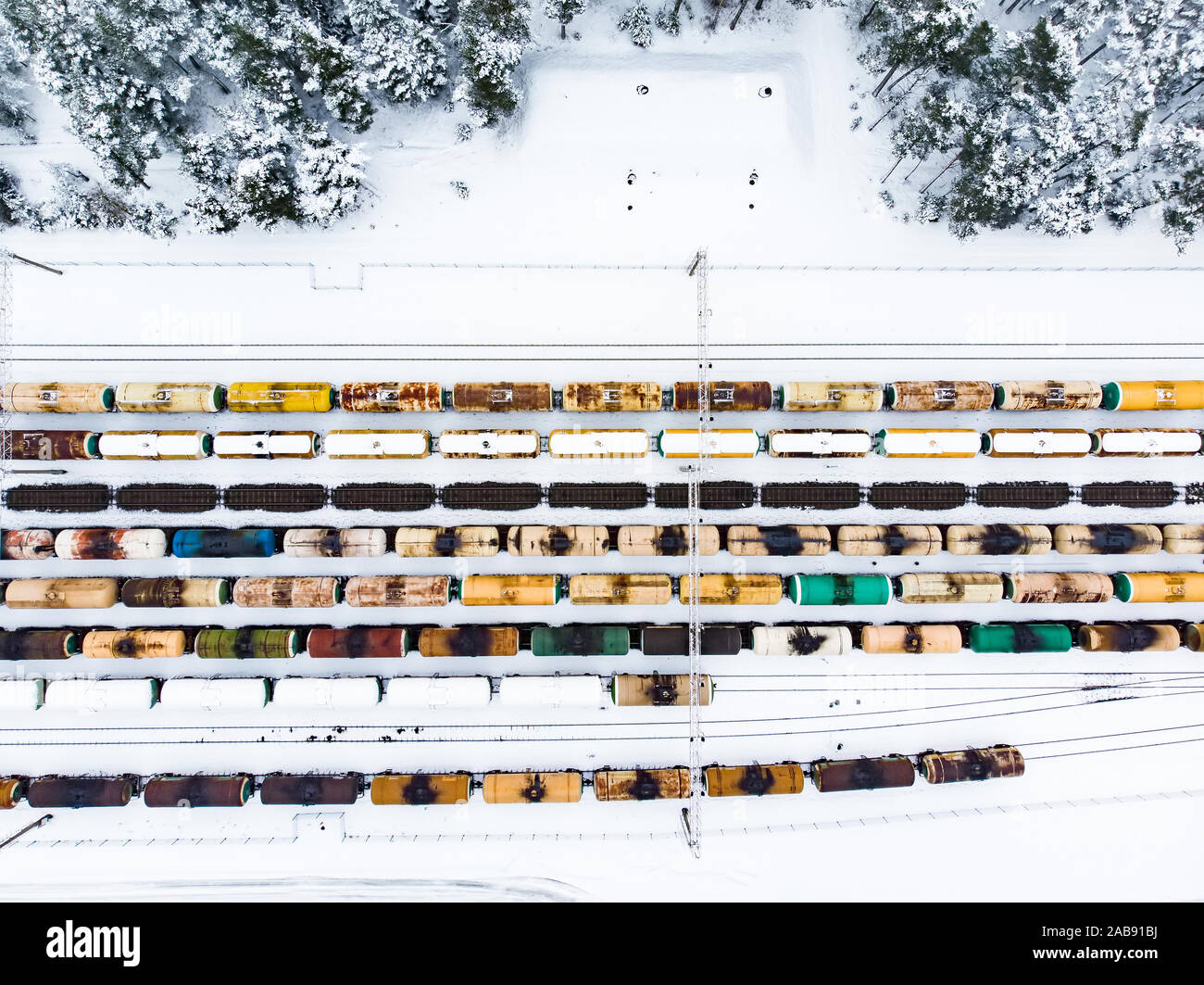 Aerial view of colorful freight train cars on the railway station ...