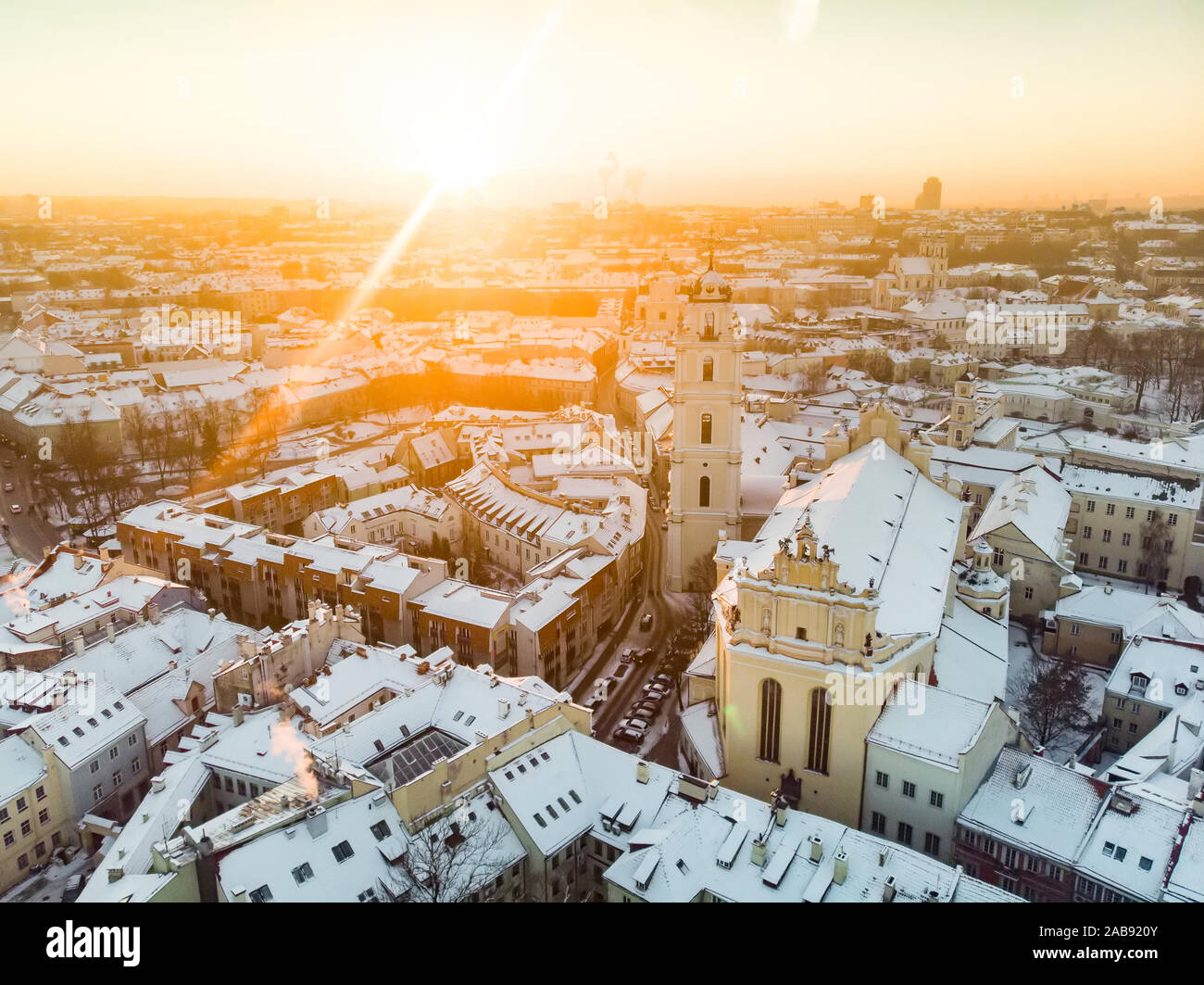 Beautiful Vilnius city panorama in winter with snow covered houses ...