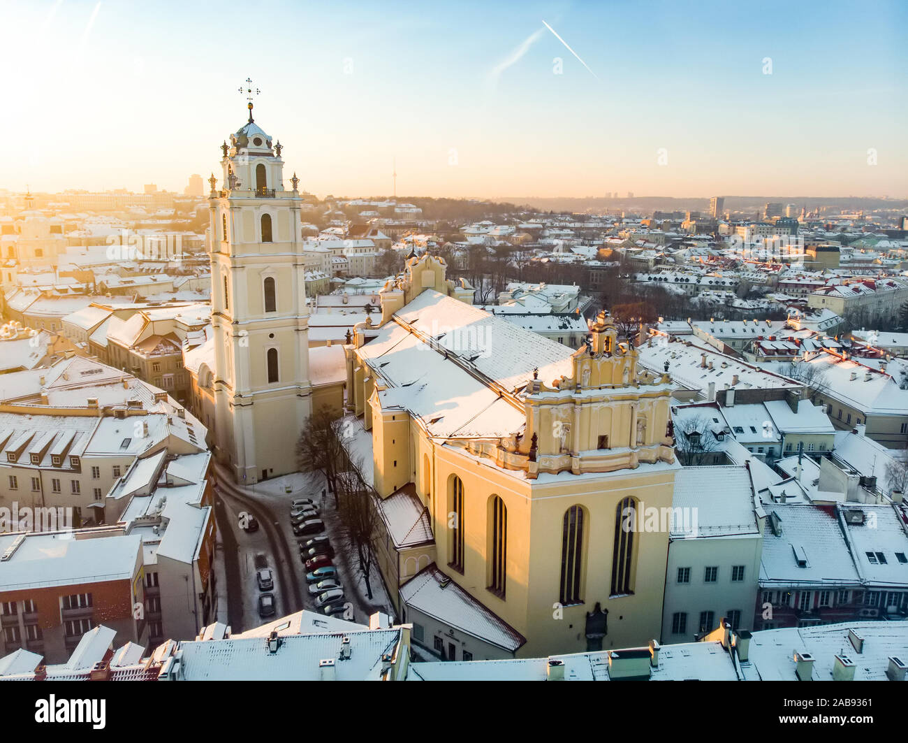 Beautiful Vilnius city panorama in winter with snow covered houses ...