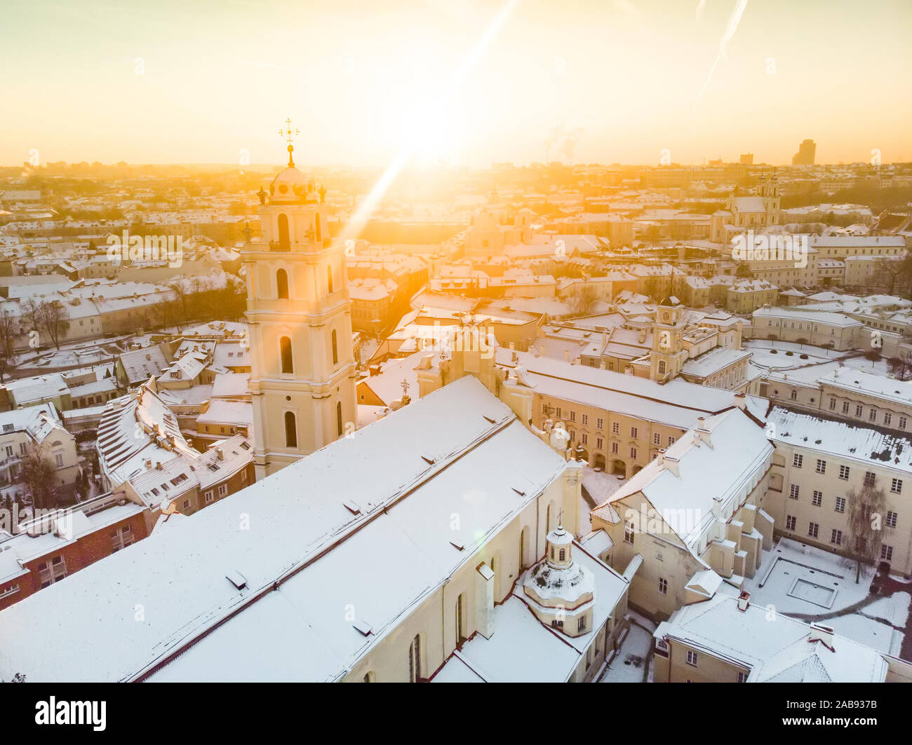 Beautiful Vilnius city panorama in winter with snow covered houses ...
