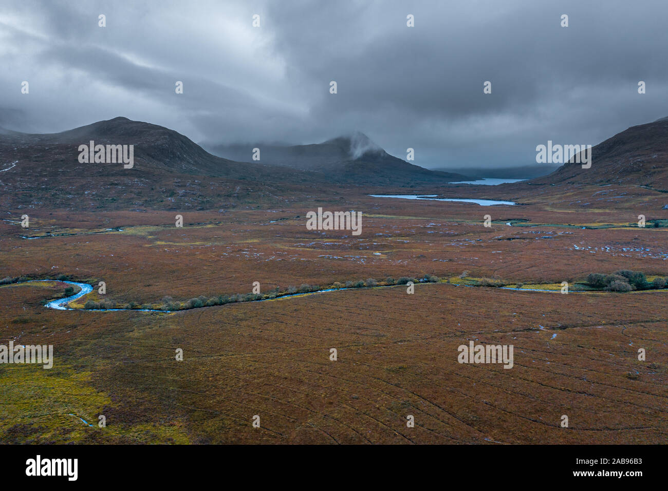 Aerial view of Ben Mor Coigach and surrounding moorland in the ...