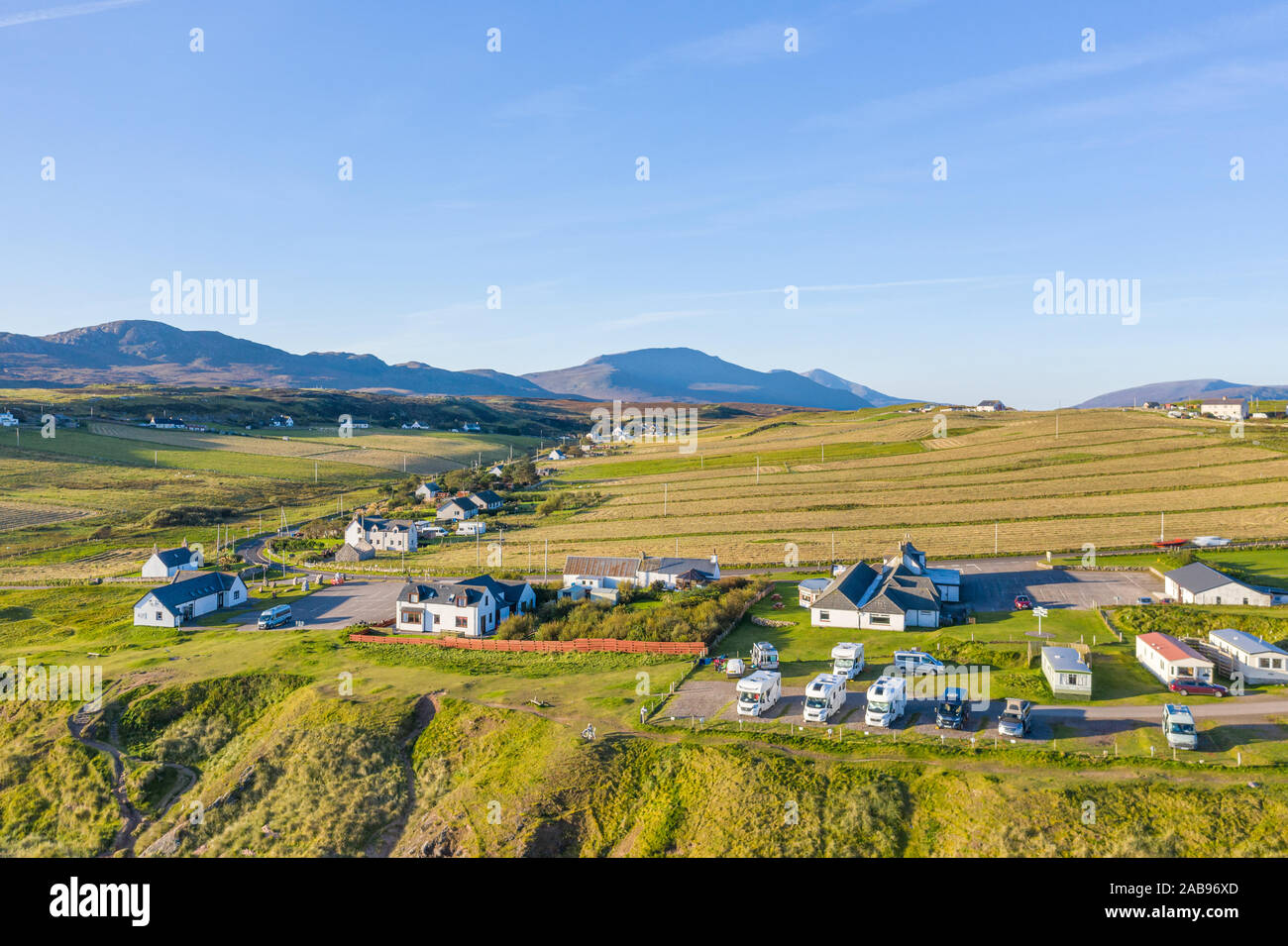 Sunny cliffs coastal village in hi-res stock photography and images - Alamy