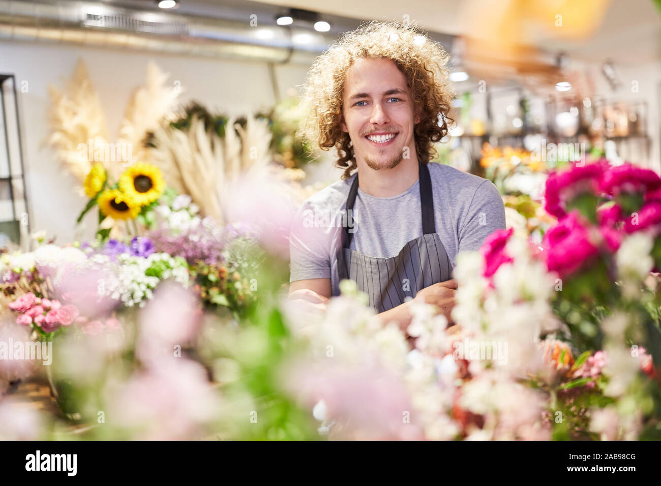 Happy florist hi-res stock photography and images - Alamy