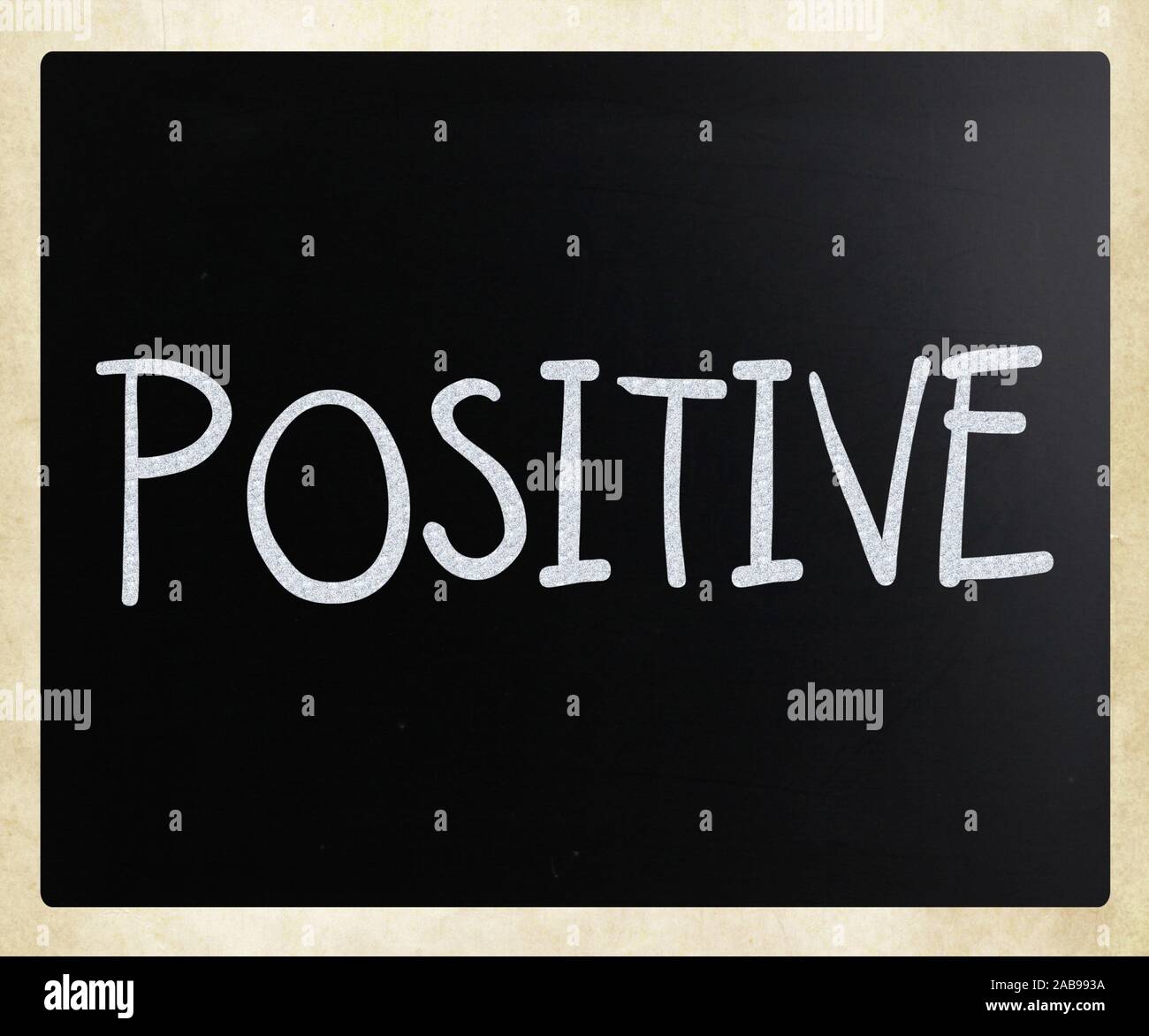 Positive"" handwritten with white chalk on a blackboard Stock Photo - Alamy