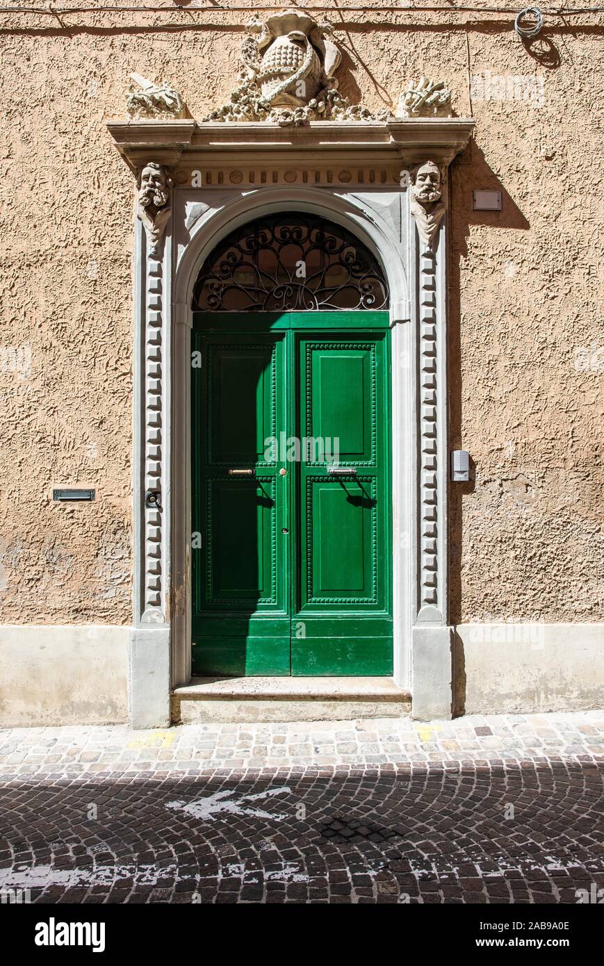 Typical italian facade with door. Italian house. Traditional style and ...