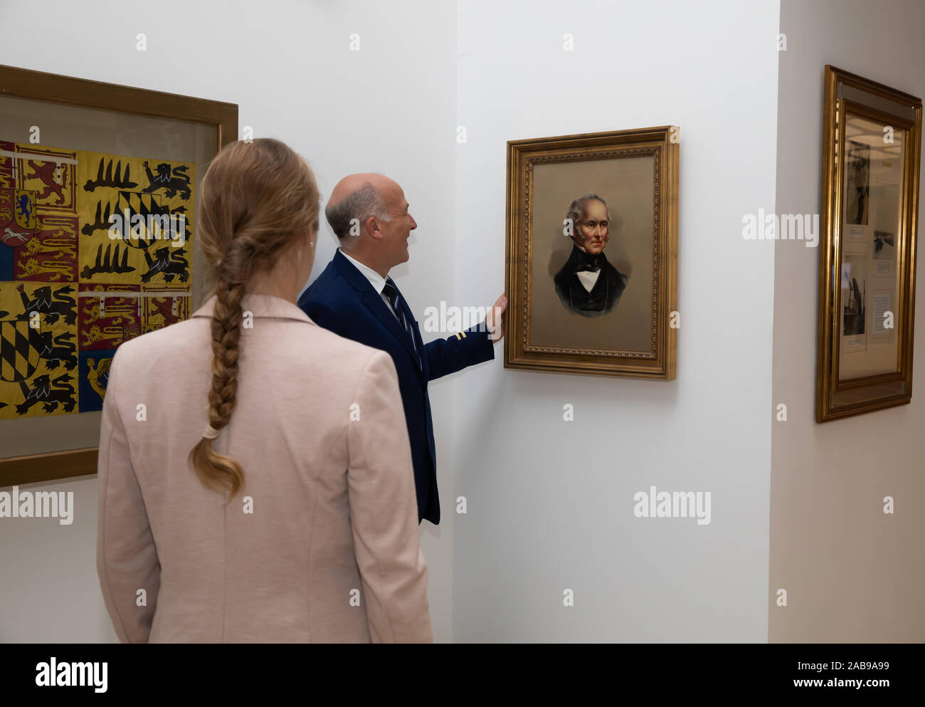 Tour manager Peter Warwick looks at a photo of Samuel Cunard, who ...