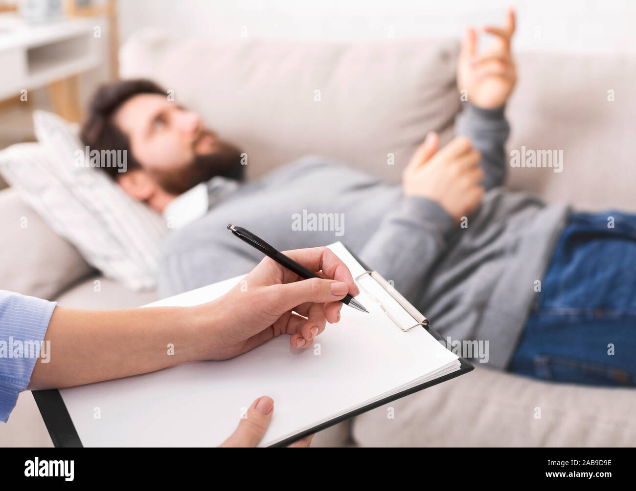 Thoughtful man talking about his problems with doctor Stock Photo - Alamy