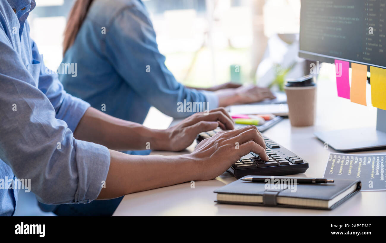 Pensive Programmer Working On On Desktop Pc Programming Code Technologies Or Website Design At