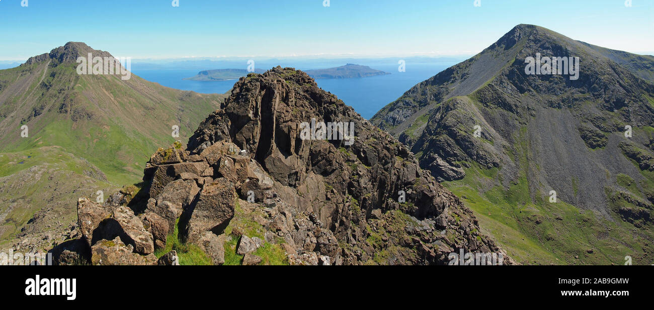 Rum Cuillin and Eigg from Trolabhal Stock Photo - Alamy