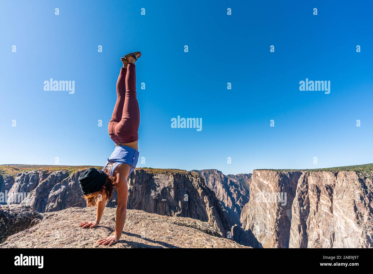 Woman doing handstand in water hi-res stock photography and images - Alamy