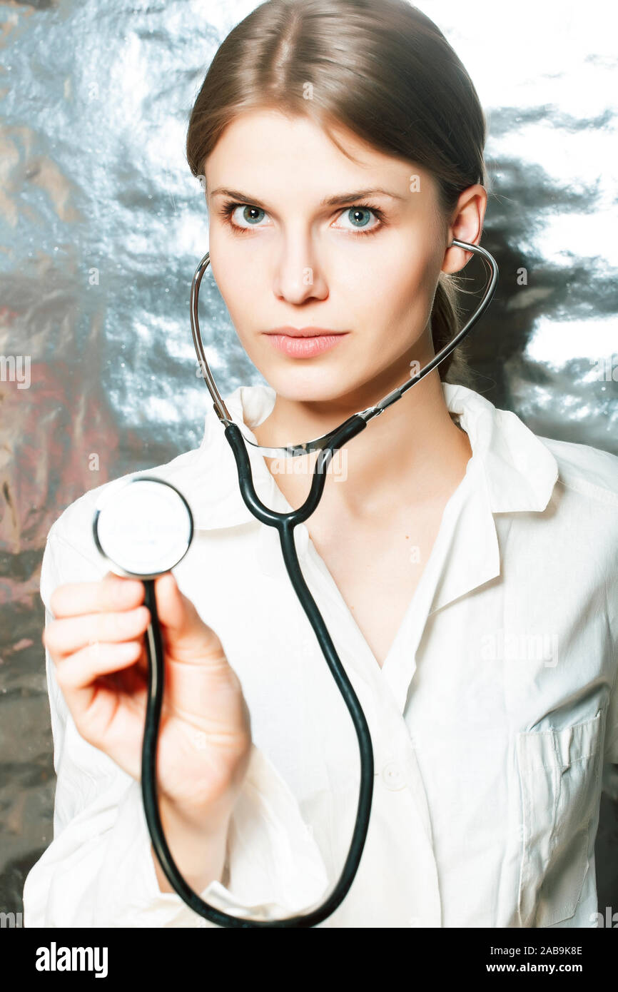 young pretty woman doctor with stethoscope, lifestyle medicine people ...