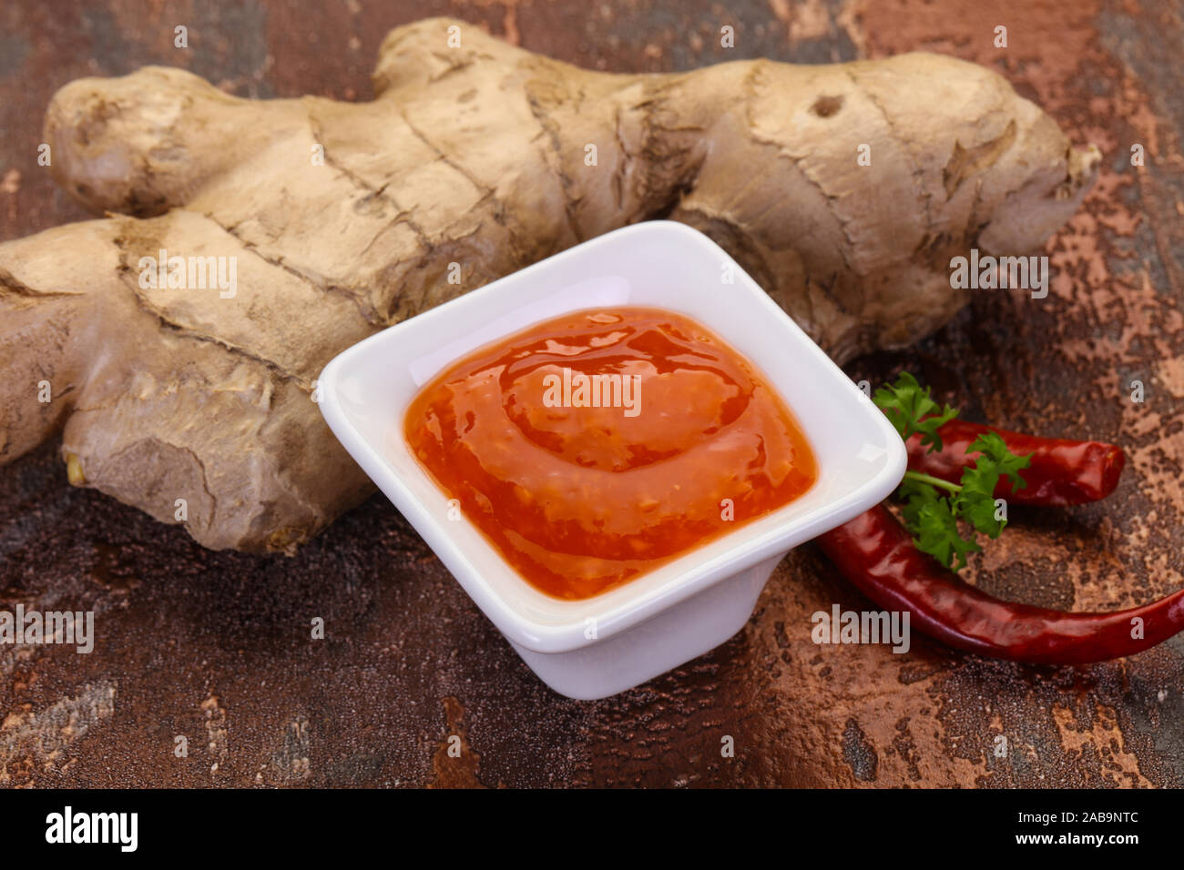 Ginger chili sauce with root and pepper Stock Photo - Alamy