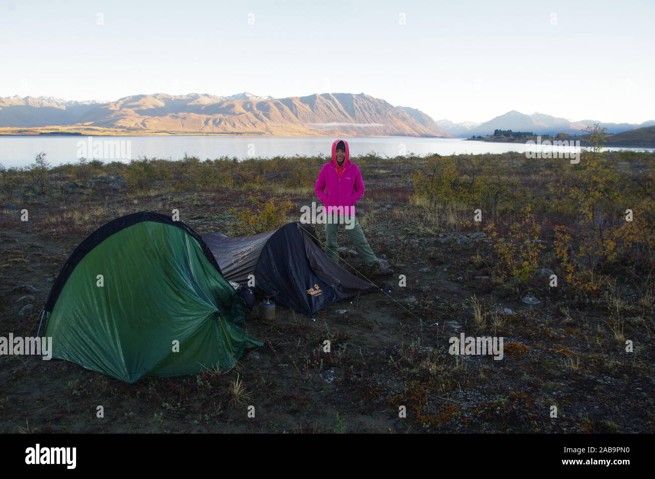 Thai female walker tramping. Lake Tekapo. Te Araroa Trail. Two Thumb ...