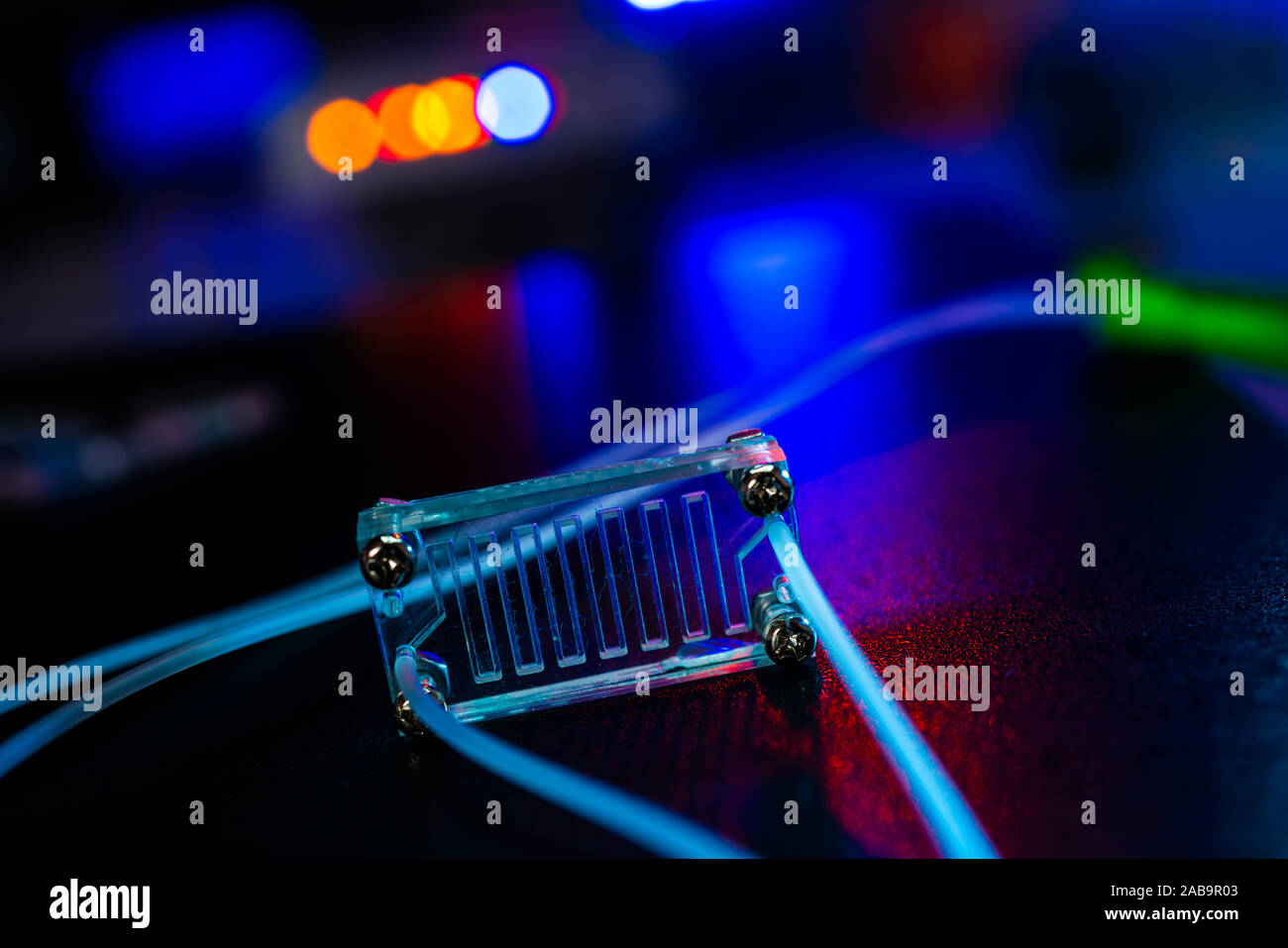 microfluidic device Instrument that uses micro amounts of fluid on a ...