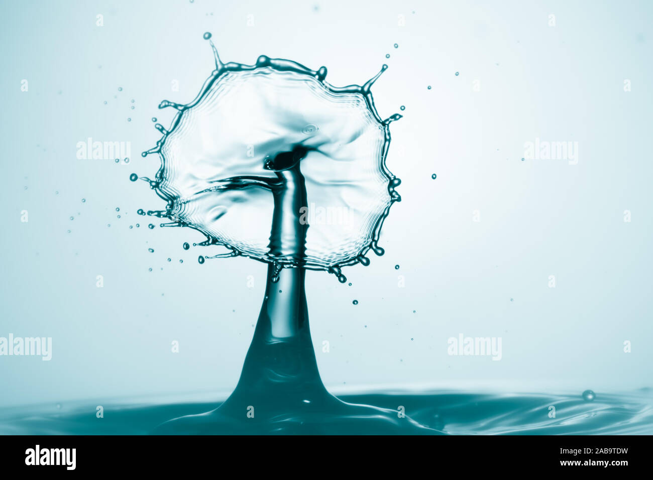 Water splash crown. Drop collision Stock Photo - Alamy