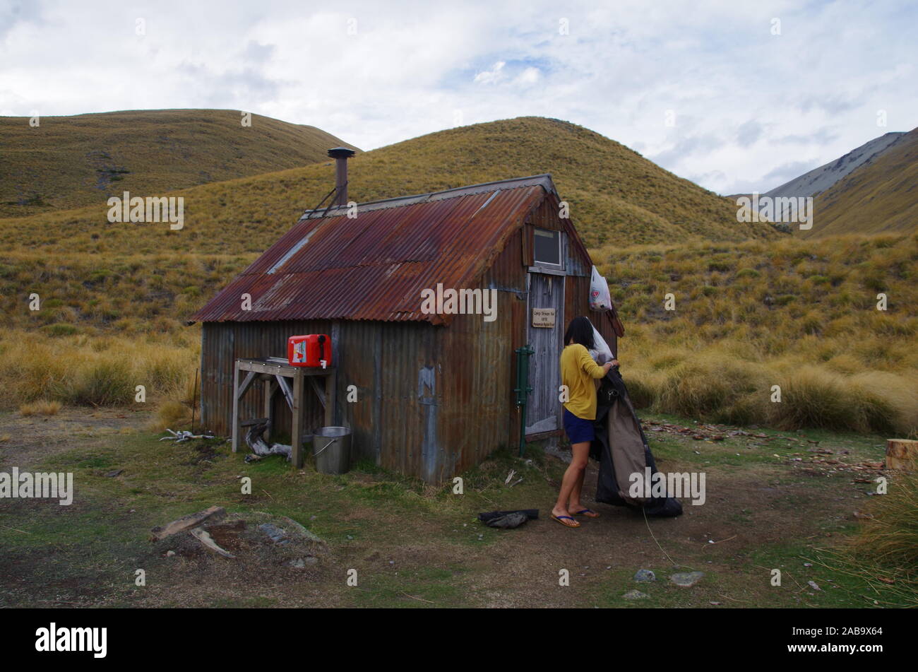 Thai female backpacker. Camp Stream Hut. Te Araroa Trail. Two Thumb ...