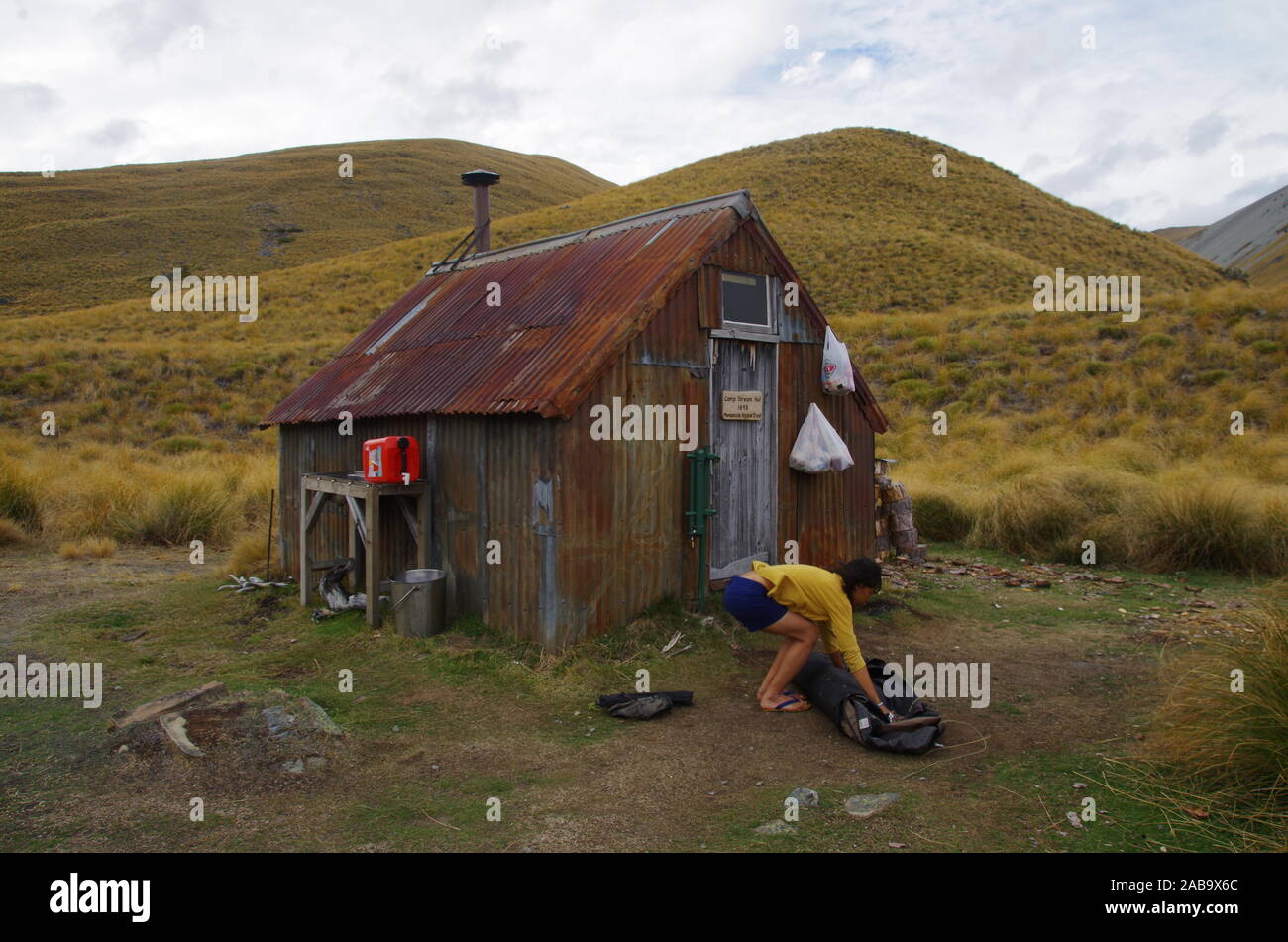 Thai female backpacker. Camp Stream Hut. Te Araroa Trail. Two Thumb ...