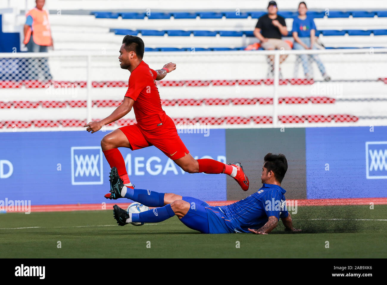 Manila, Philippines. 26th Nov, 2019. Saddil Ramdani (L) of Indonesia vies with Srayut Sompim of ...