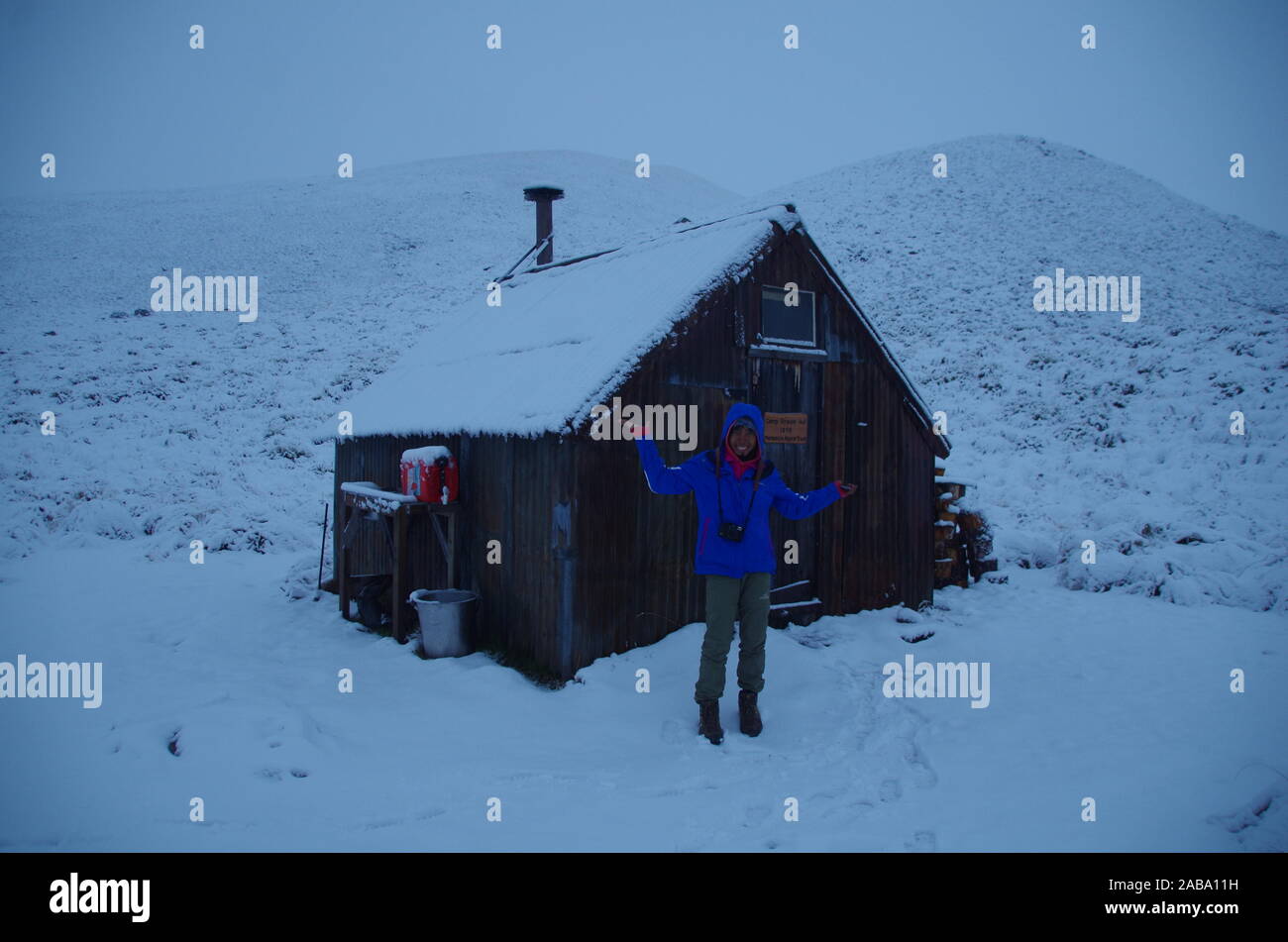Thai female hiker. Camp Stream Hut snow. Te Araroa Trail. Two Thumb ...