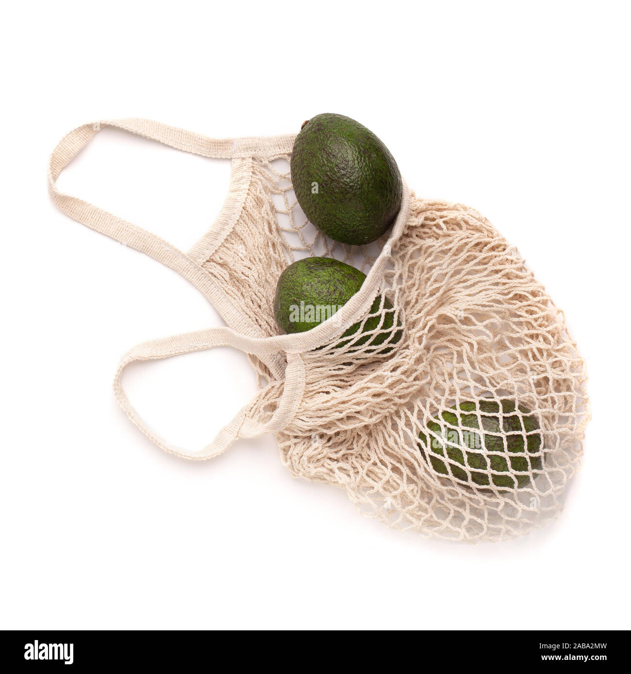 Healthy fresh avocado in zero waste net bag isolated on white Stock ...