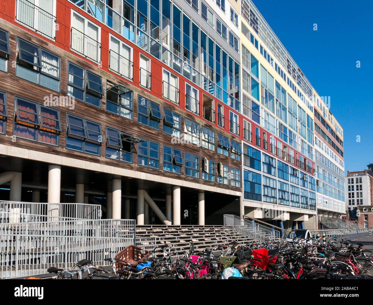 Modern colorful social housing apartment building Silodam alongside IJ ...