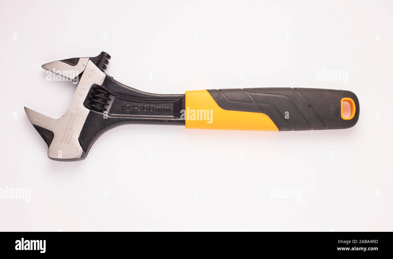 Spanner on a white background Stock Photo - Alamy