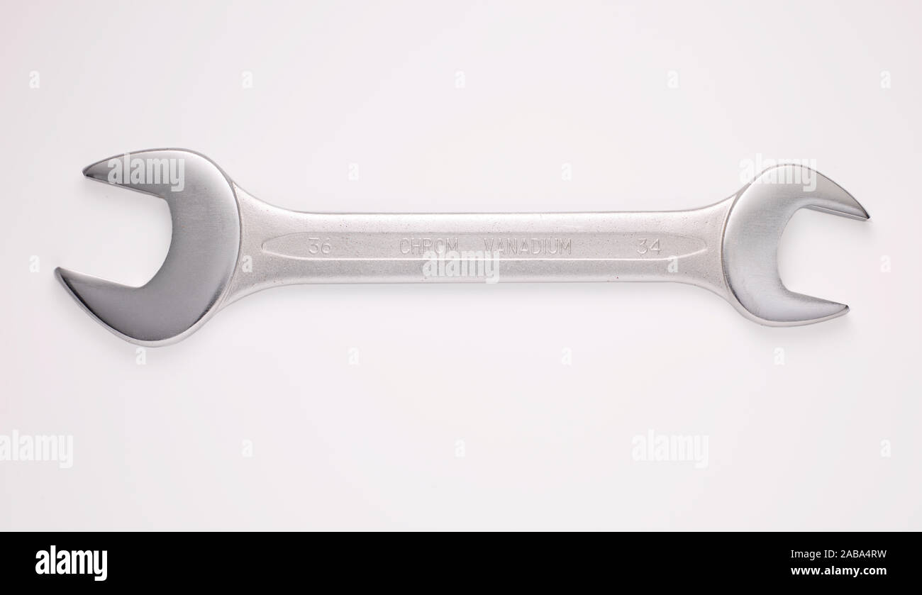 Spanner on a white background Stock Photo - Alamy
