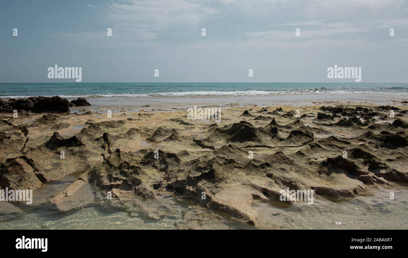 Unusual limestone formation covering parts of the northern coast of the ...