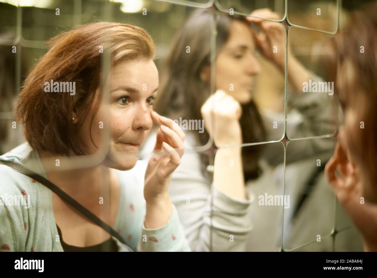 Checking for blemishes hi-res stock photography and images - Alamy