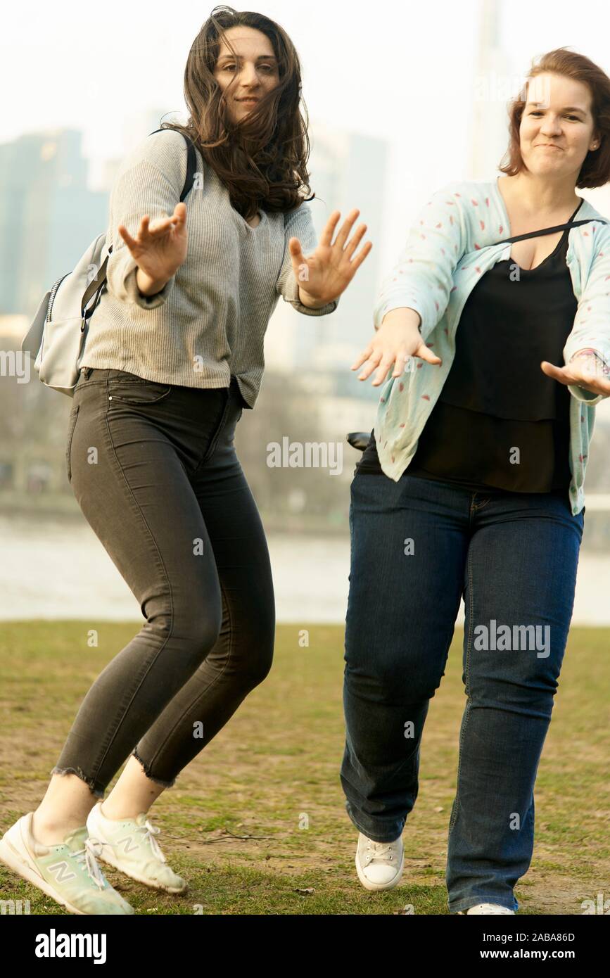 Two friends dancing, in Frankfurt, Germany Stock Photo - Alamy