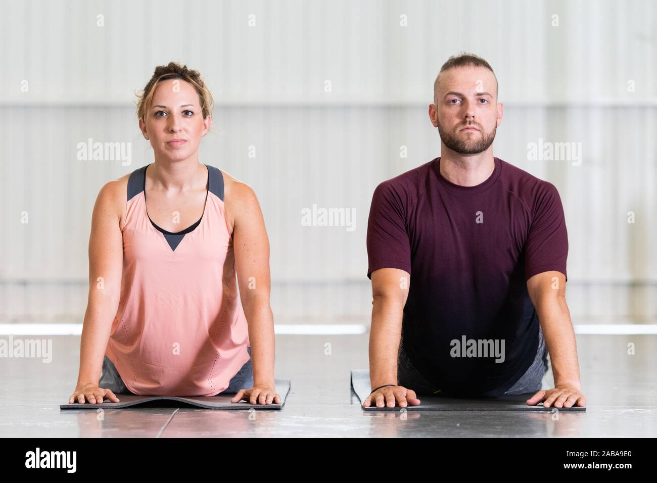 Two woman stretching hi-res stock photography and images - Alamy