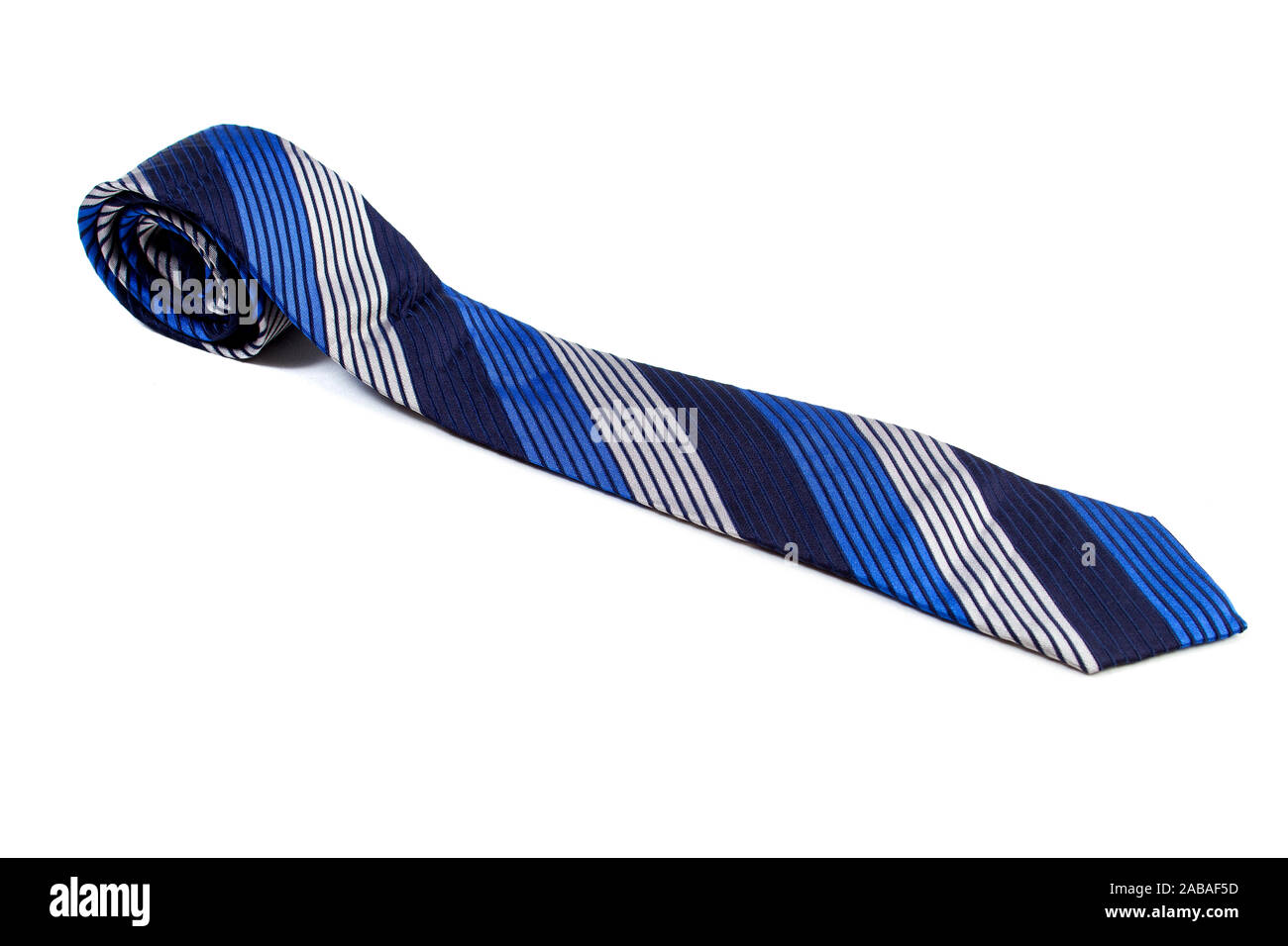 blue striped tie.classic men's tie folded in a roll. isolated on white ...