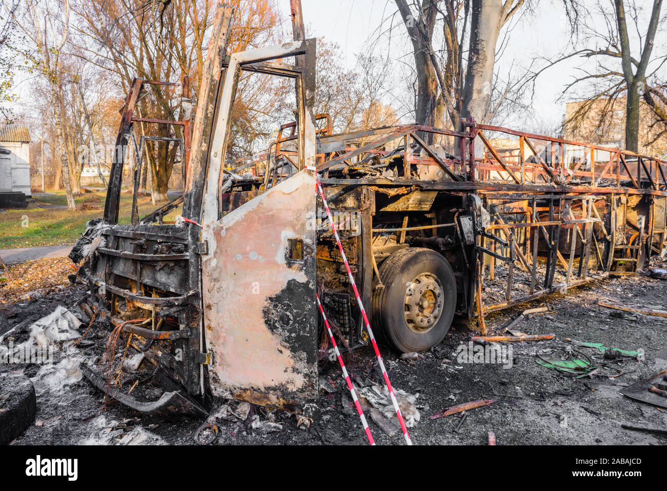 Burnt bus is seen on the street after caught in fire during travel ...