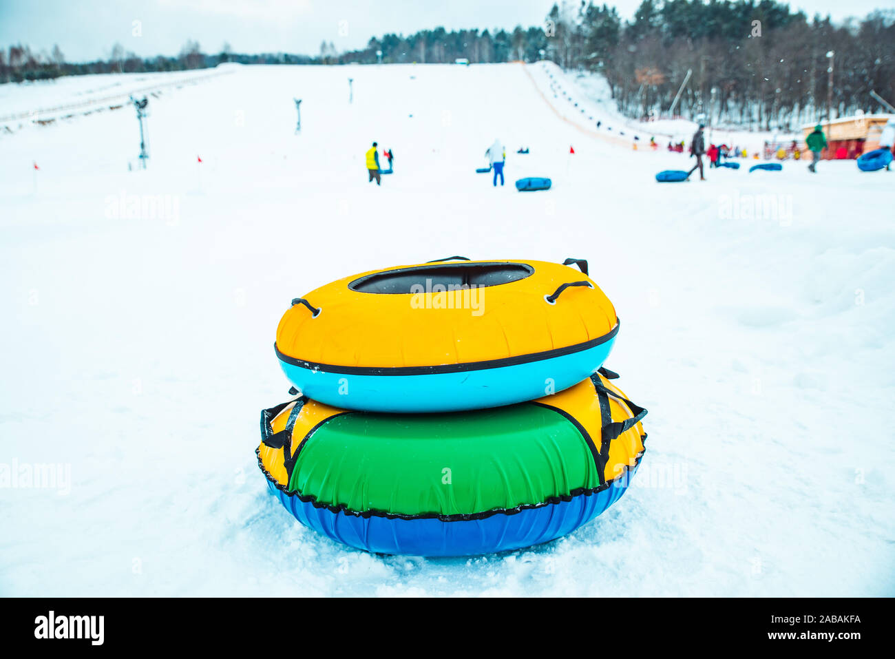 Women snow tubing hi-res stock photography and images - Alamy
