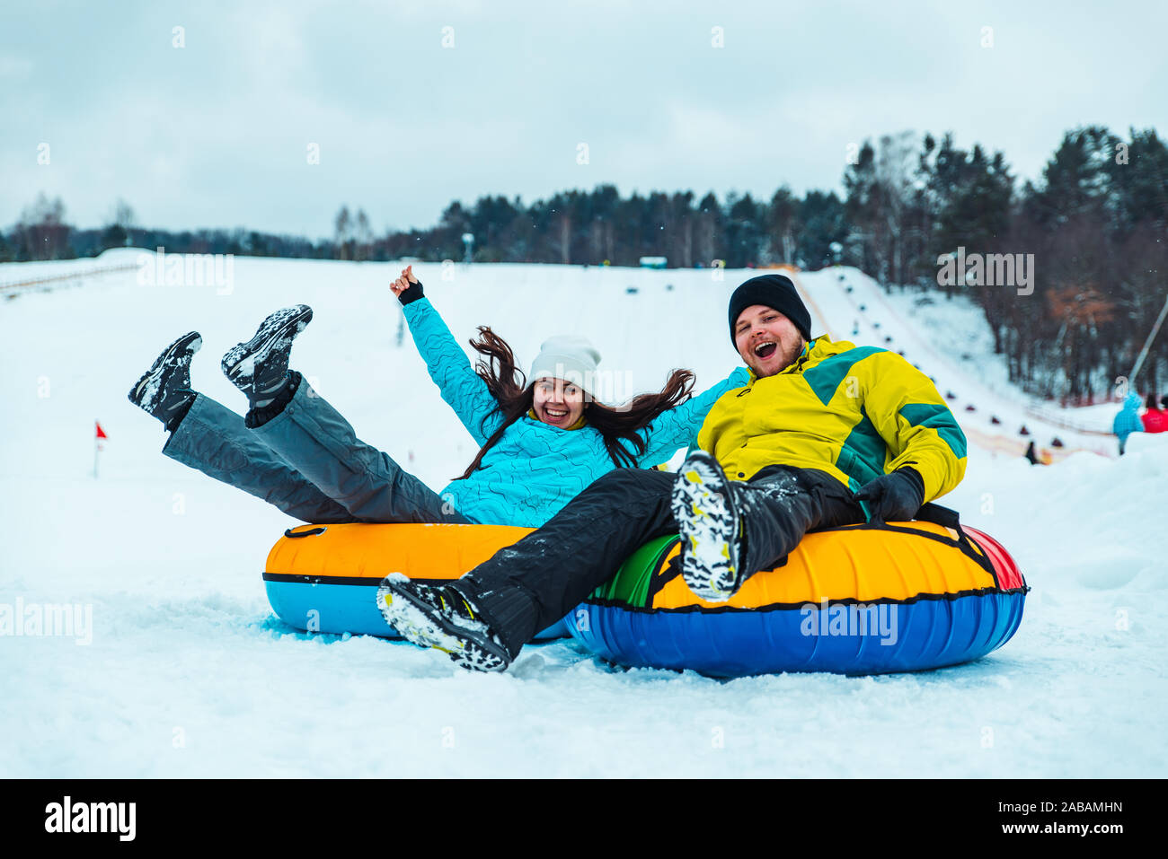 Adult man sliding down slide hi-res stock photography and images - Alamy