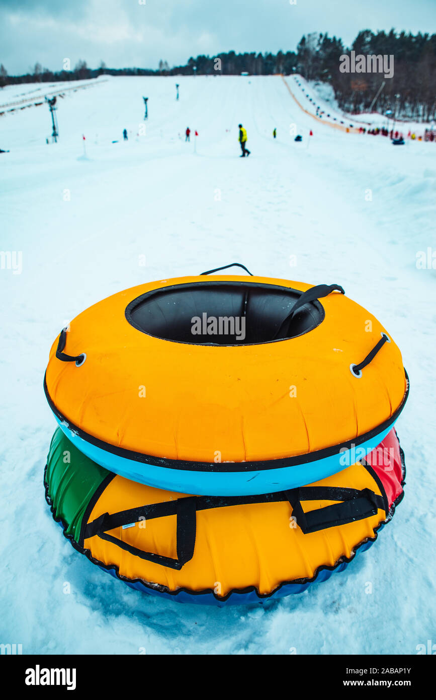 snow tubing rings close up. hill on background Stock Photo - Alamy