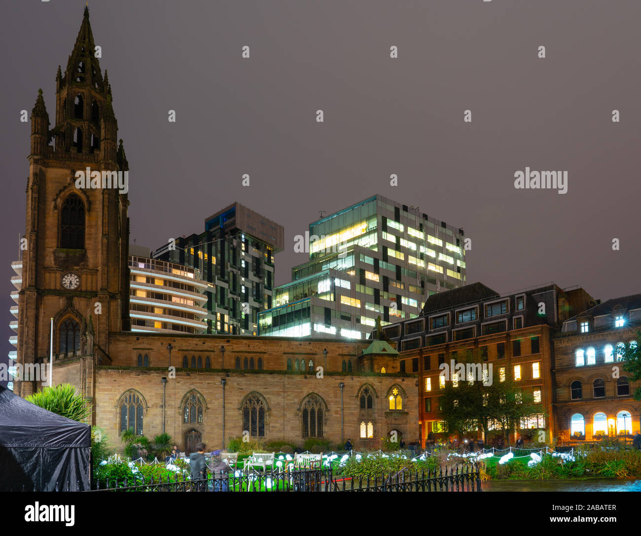 Saint Nicholas Church and gardens, Liverpool, with the modern office ...