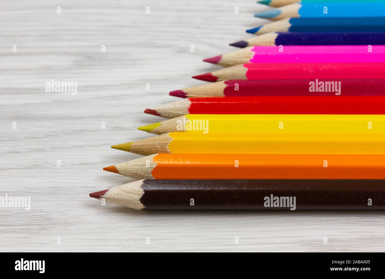 Yellow pencil on white background Stock Photo - Alamy